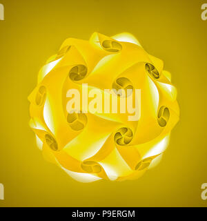 Glowing polygon lampshade. Geometric pattern. Golden light Stock Photo ...