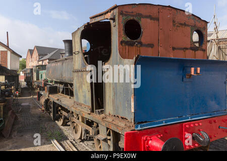 A derelict and rusting steam engine at the Cambrian Heritage Railway ...