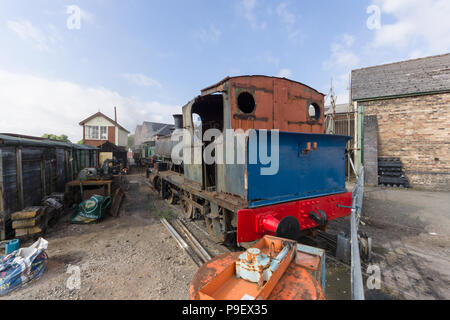A derelict and rusting steam engine at the Cambrian Heritage Railway ...