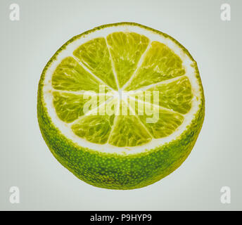 One half of a juicy lime, close-up, on a white background Stock Photo ...