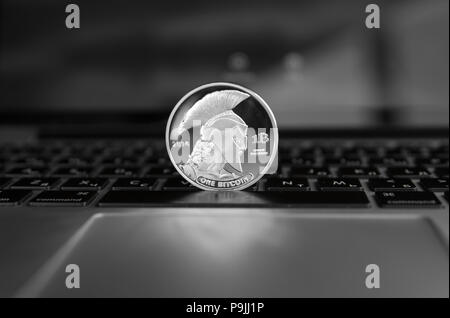 Titan bitcoin coin symbol on laptop. Concept financial currency, crypto ...