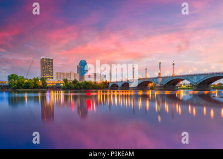 The downtown city skyline and buildings of Springfield MO under partly ...