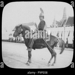 A mounted Siamese cavalryman in Bangkok, Thailand, is depicted with the ...