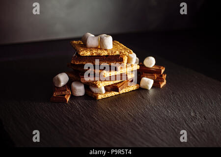 Dark moody style of S'mores summer treat in studio Stock Photo - Alamy