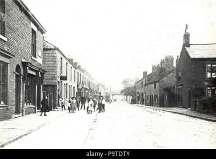A 1905 photograph of Compstall Road in Romiley, England, depicting ...