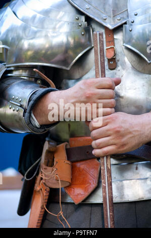 Medieval Knight Dressing in Armor Stock Photo - Alamy