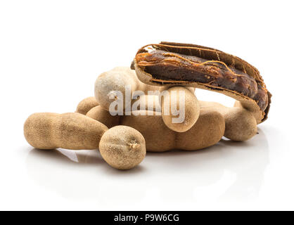 Tamarind stack one open with brown jelly flesh isolated on white ...