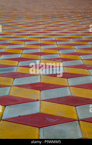 Red and yellow footpath tiles Stock Photo - Alamy