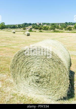 Hay bales and Bolton Castle Stock Photo - Alamy