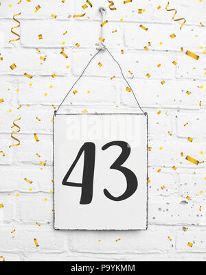 Golden number forty three 43 made of inflatable balloon with ribbon on ...