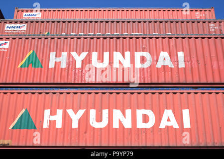 Stack of shipping containers and south korean won money bag. Trade ...