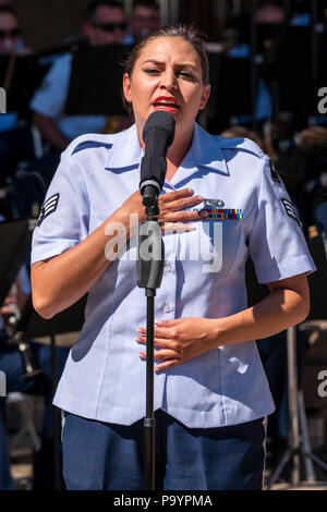 Female vocalist singer; United States Air Force Brass Band plays a ...