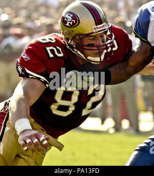 San Francisco 49ers tight end Eric Johnson gets a first down after a ...