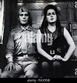 The Italian actor and director Nino Manfredi holding the puppet of ...