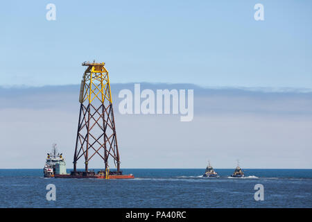 Offshore platform being towed to the mouth of the River Tyne at ...