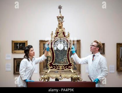 Horology conservators Daniela Corda and Matthew Read as a highly ornate ...
