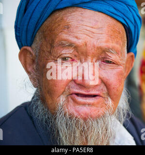 SAMARKAND, UZBEKISTAN - JUNE 10, 2011: Unidentified Uzbek man smiles ...