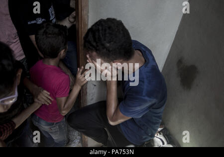 A Palestinian relative of Mohammed Badwan, 27, who was shot and killed ...