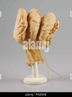 Cap. Culture: American. Date: 1810-20. The close-fitting helmet shape ...