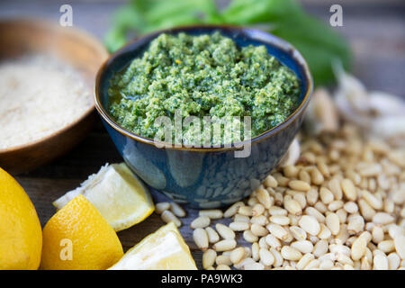 Bowl of homemade pesto and fresh ingredients viewed from above Stock ...
