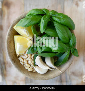 Basil, pine nuts, garlic, lemons and nutritional yeast: ingredients for ...