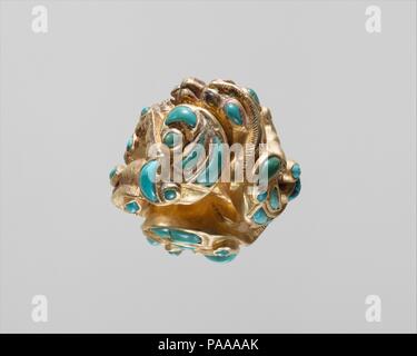 Pommel in the shape of coiled animals, ca. 6th century B.C Stock Photo ...