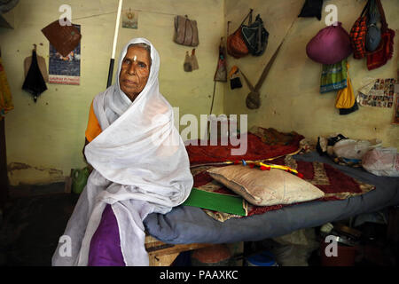 Portrait of Hindu widow woman living in an ashram in Vrindavan , India ...