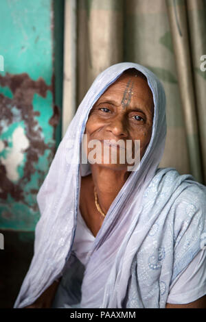 Portrait of Hindu widow woman living in an ashram in Vrindavan , India ...