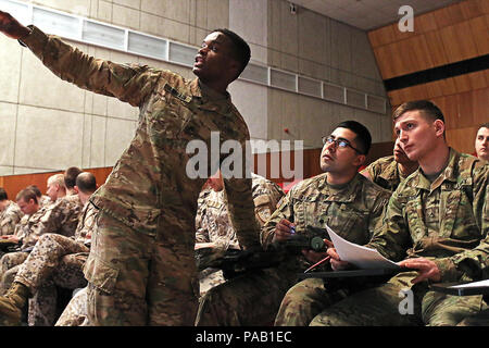 Pfc. Justin Giaimo (right), and Spc. Fortino Licea (second on right ...