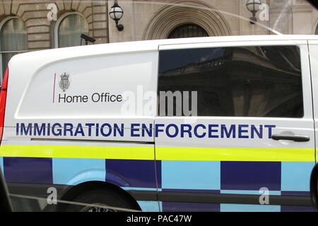 Home Office Immigration Enforcement van parked outside a building in ...