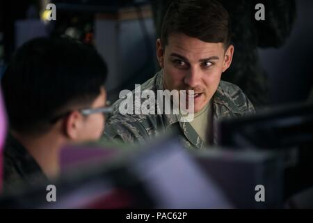 Members of the 607th Air Operations Center render a first salute to Col ...