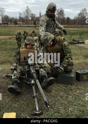 Moldovan soldiers assigned to the 22nd Reconnaissance Battalion conduct ...