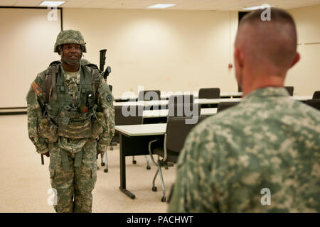 Sgt. Adolphus Bryant, with the 719th Movement Control Battalion ...