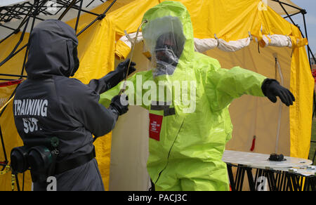 U.S. Soldiers assigned to the 21st Chemical Company, perform self ...