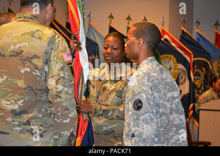 Command Sgt. Maj. Steven Campbell passes the 2nd Armored Brigade Combat ...