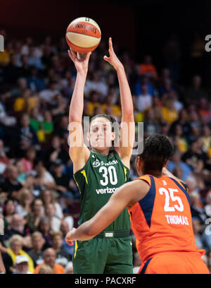Seattle Storm forward Breanna Stewart reacts out to feel rain drops ...