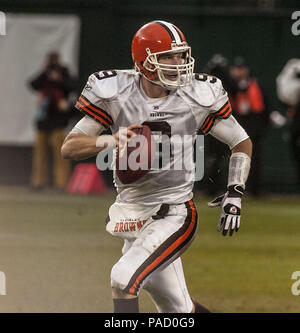 Cleveland Browns quarterback Charlie Frye scrambles trying to avoid the ...