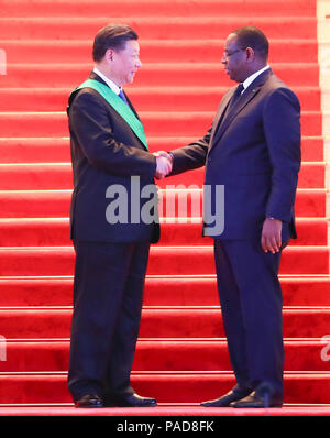 Chinese President Xi Jinping, top left, and Chinese Premier Li Qiang ...