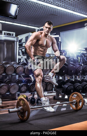 guy bodybuilder tired sit in gym and drink sportive nutrition - protein ...