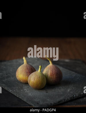 Figs on a grey slate Stock Photo - Alamy