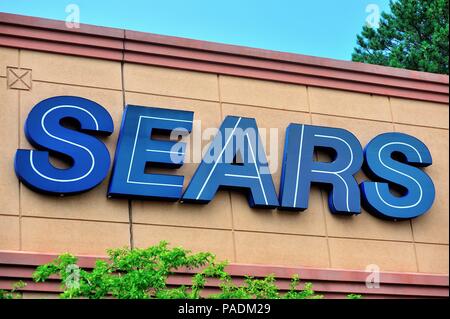 An old Sears Roebuck & Company store sign on a art deco facade Stock ...