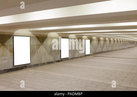 Three blank billboard advertisement posters on underground wall Stock ...