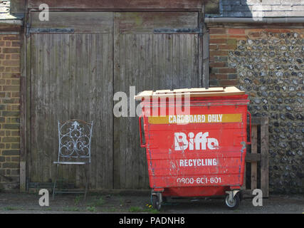 Red Biffa waste wheelie bin Stock Photo - Alamy