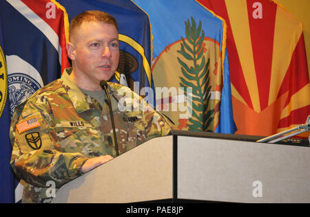 Command Sgt. Maj. James P. Wills, accepts the colors from Lt. Gen ...