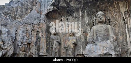 The stone carvings in the Longmen Grottoes in Henan province in China ...