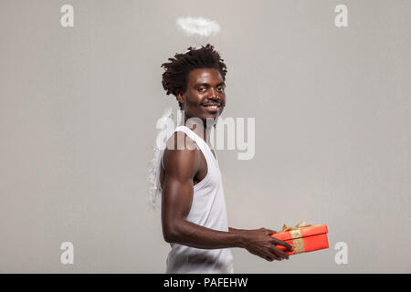 Bearded man in angelic wings with red paper heart. Valentines day card ...