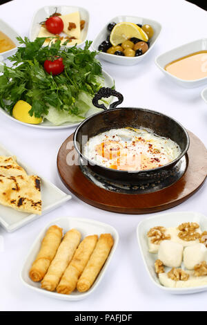 Traditional Turkish food; fried eggs with bacon. Turkish name ...