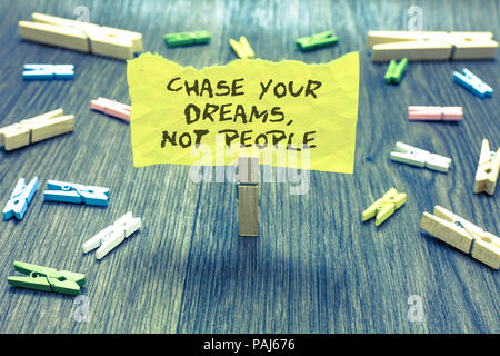 Handwriting text Chase Your Dreams, Not People. Concept meaning Do not ...
