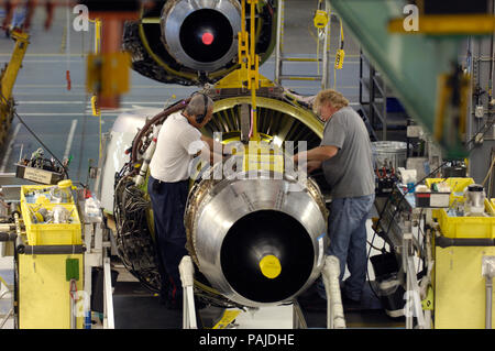 engineers working on a CFM-56-7B engine on the production-line Stock ...