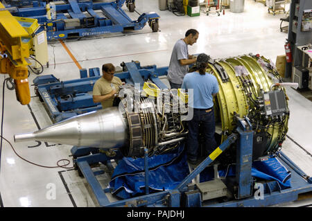 engineers working on a CFM-56-7B engine on the production-line Stock ...